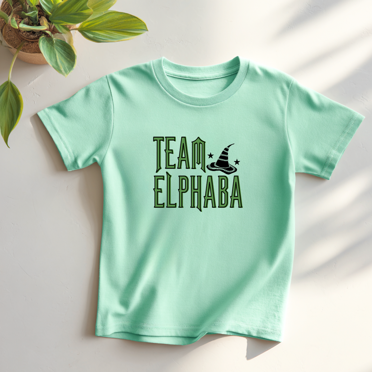 Team Elphaba - Wicked Inspired Green Kid's Tee – Moonlight Makers Retail